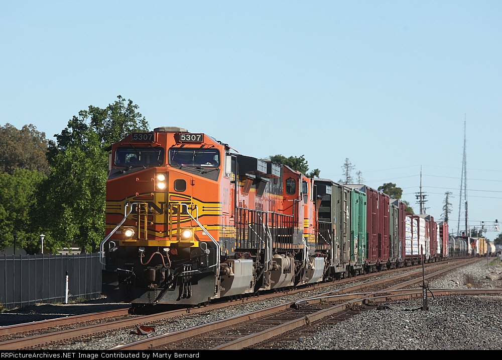 BNSF 5307 SB on UP Waiting for a Signal (an Amtrak has to clear) to Turn on to BNSF Tracks to ...